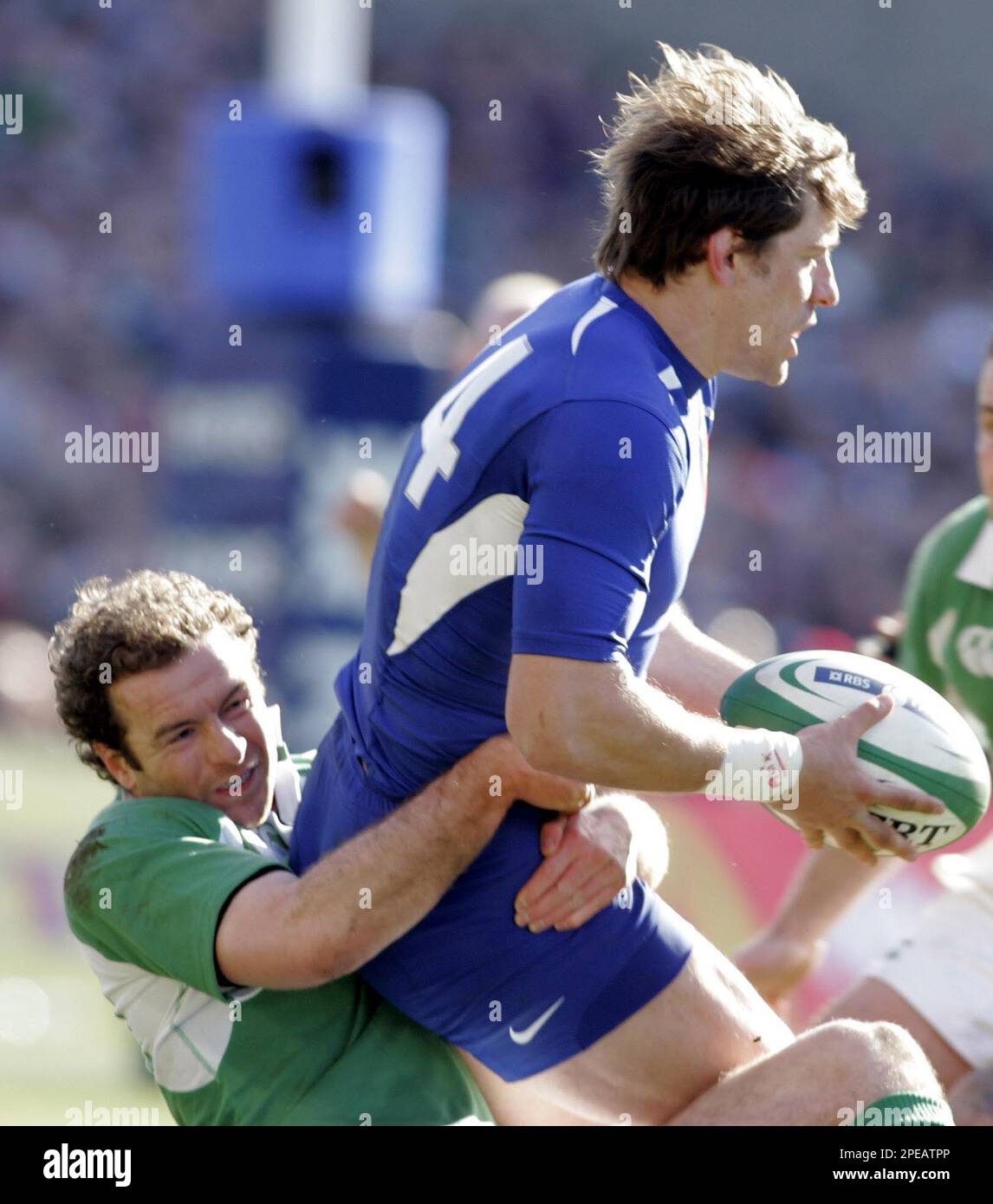 Ireland's Geordan Murphy tackles France's Cedric Heymans during the ...
