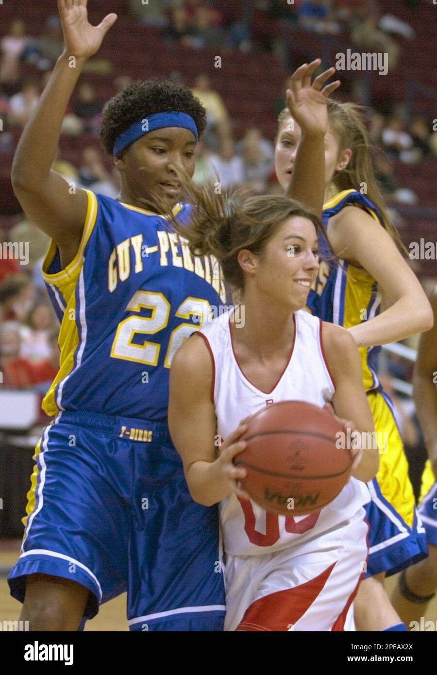Rural Special's Tasha Owens, right, looks to pass as she is pressured ...