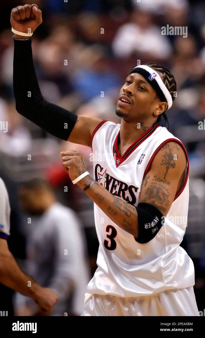Philadelphia 76ers' Allen Iverson celebrates as the first half ends ...