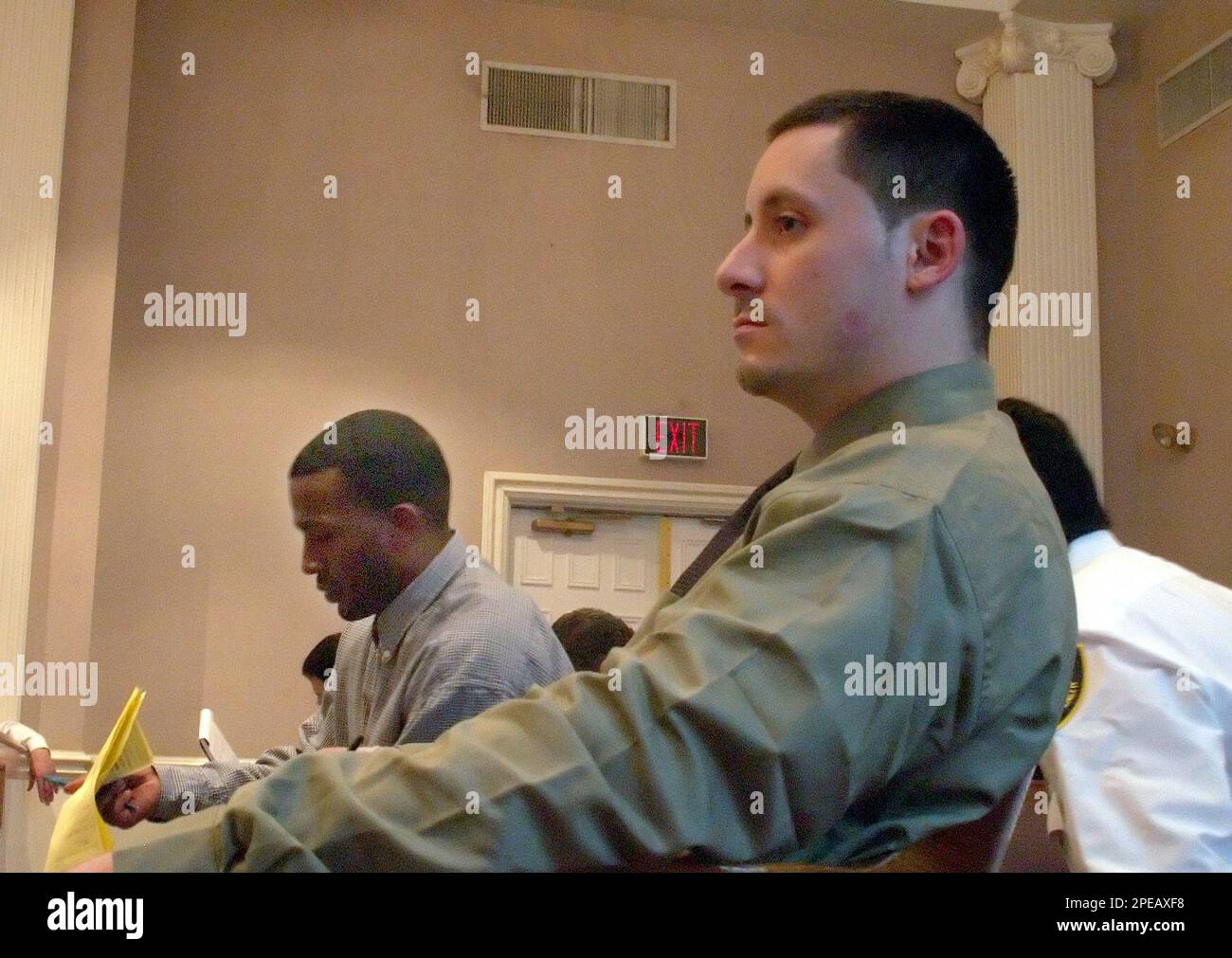 Ismael Vasquez, right, and Harold Parker, background left, two of the ...