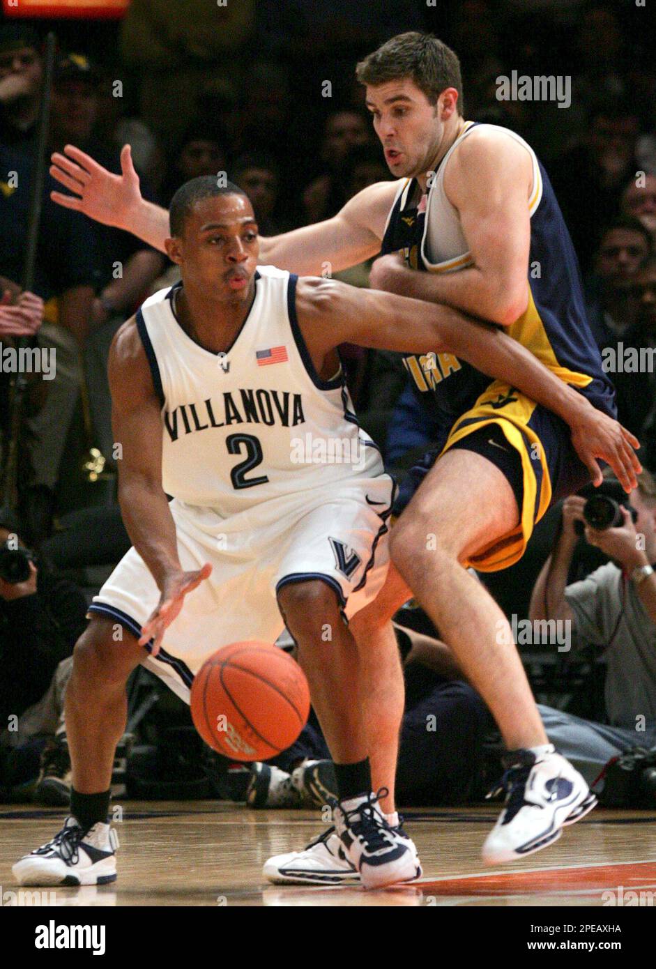 Randy Foye, left, of Villanova is guarded by Joe Herber of West ...