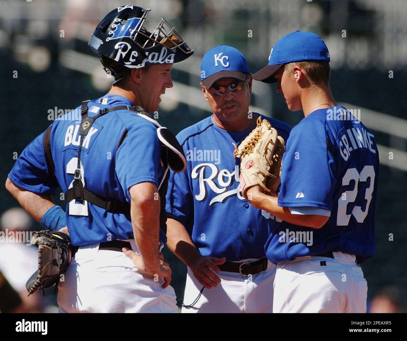 Kansas City Royals catcher John Buck (2) and pitching coach Guy Hansen ...