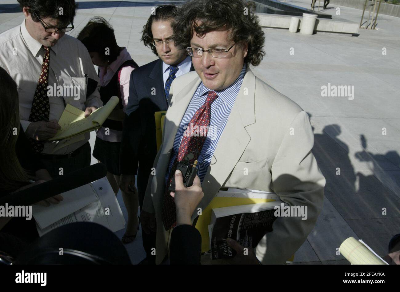 David Chesnoff, center, attorney for Stephen Caracappa, addresses the ...