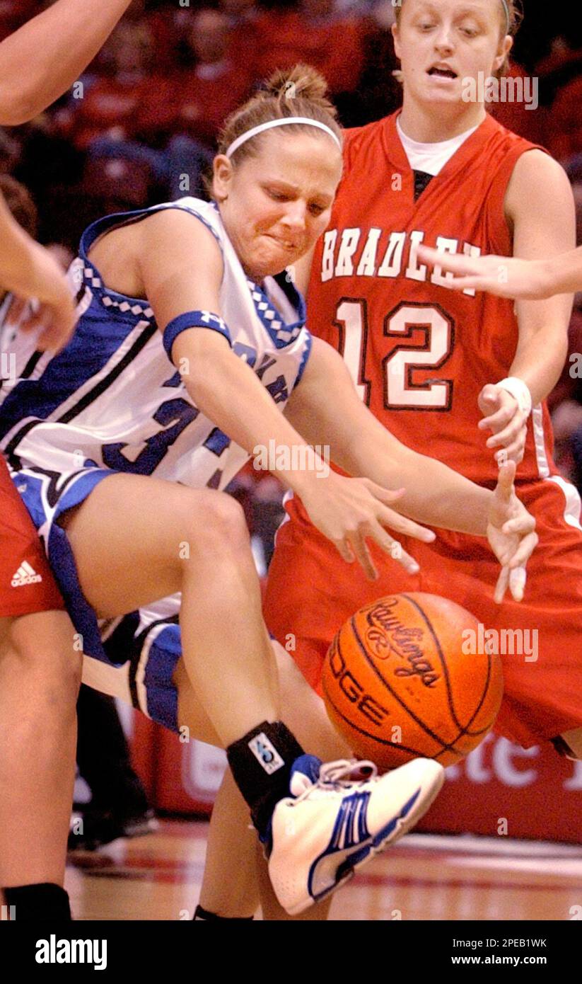 Indiana State's Jackie Gustaffson, left, chases a loose ball in front ...