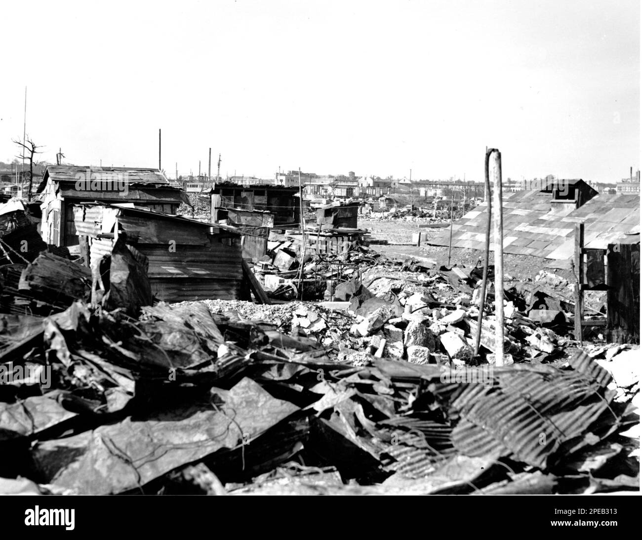 **FOR USE WITH FIREBOMBING TOKYO** FILE** Makeshift housing built from ...