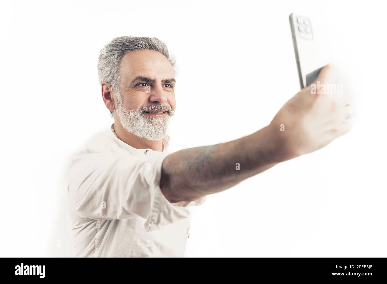 Middle-Aged Caucasian man taking a selfie using his smart phone ...