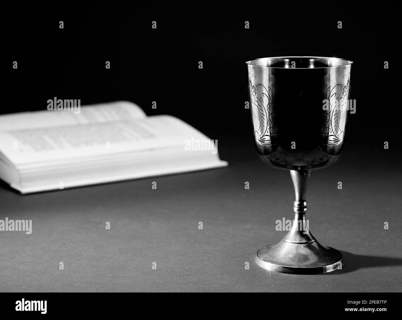 golden chamice with open book ,black and white Stock Photo - Alamy