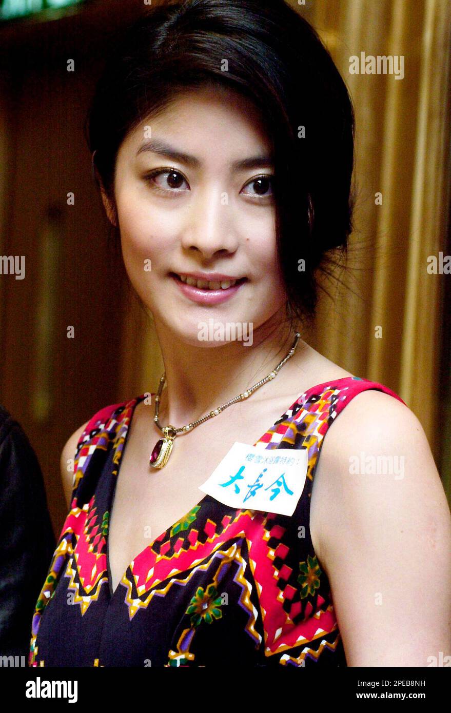Hong Kong singer Kelly Chen poses for photographers at a press ...