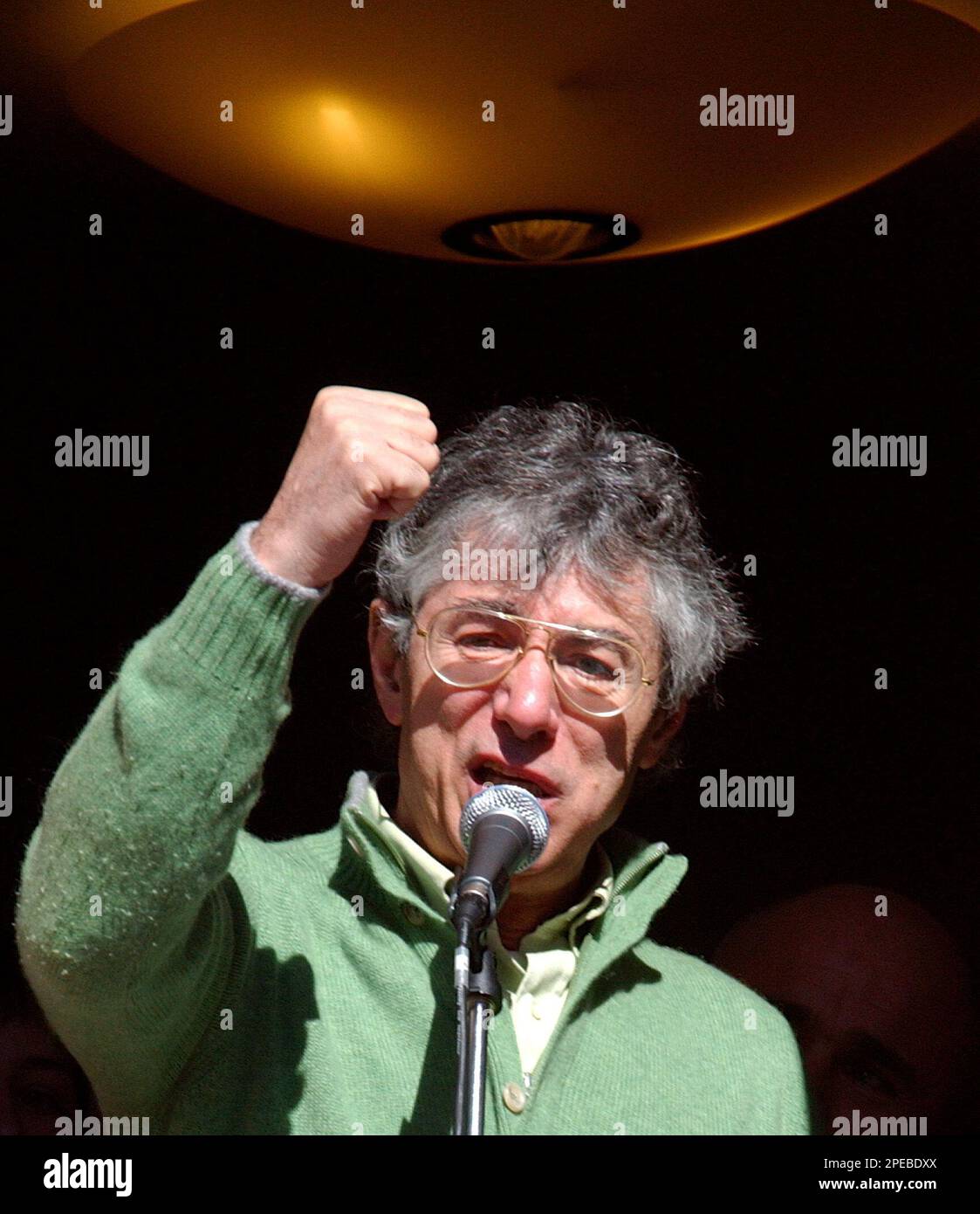 Northern League leader Umberto Bossi salutes from a window of the home ...