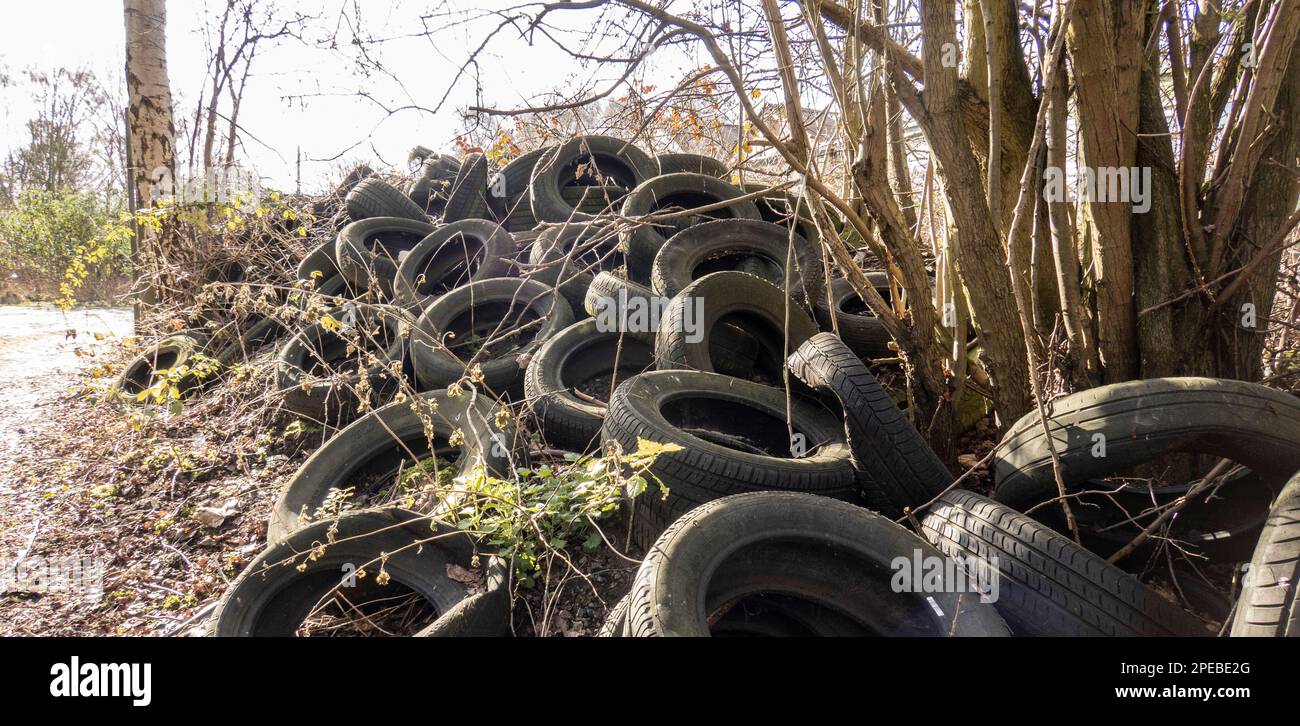 Old car tires. Pile of old car tires. Industrial background Stock Photo ...