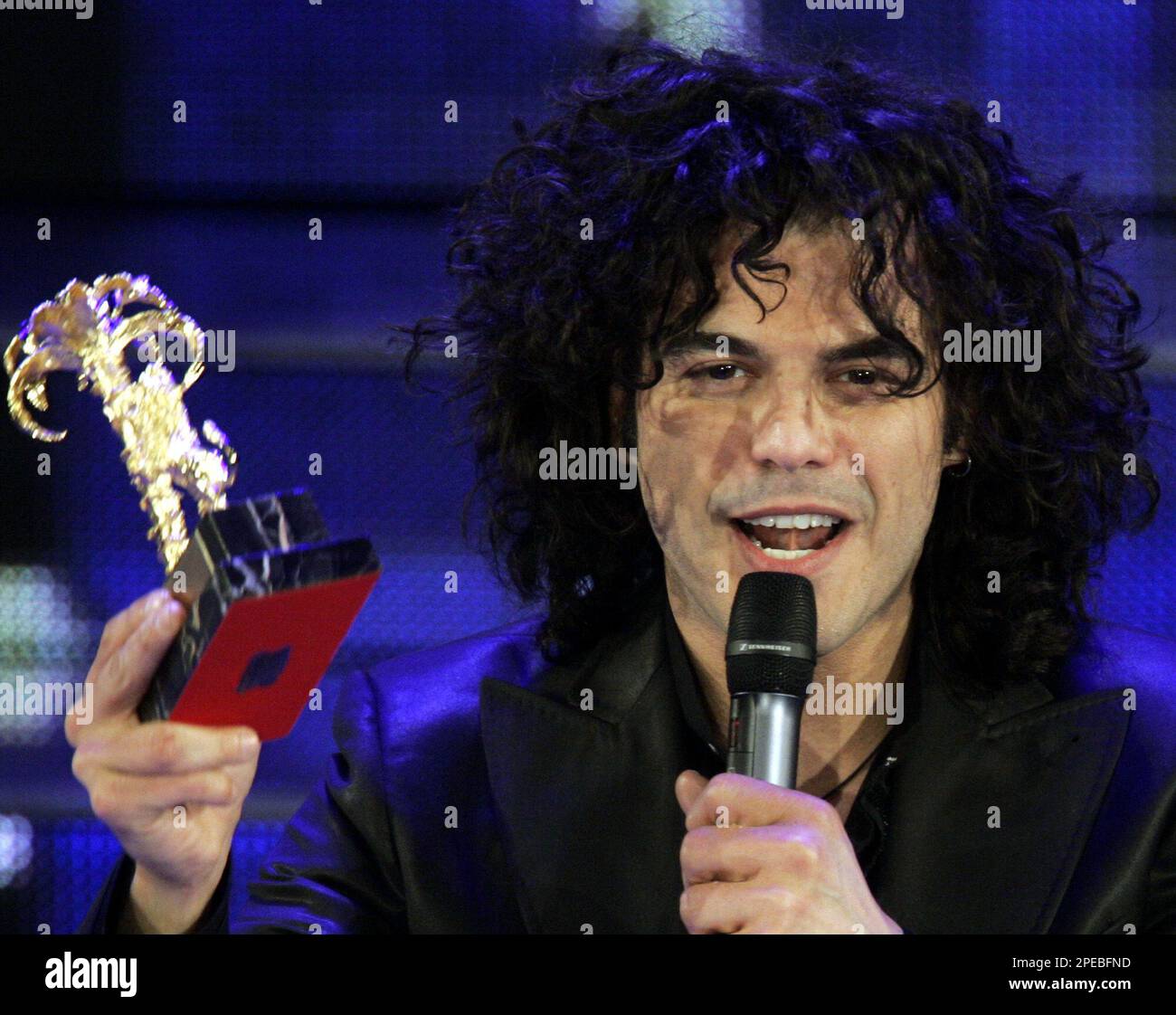 Francesco Renga shows the trophy for winning the Festival di Sanremo ...