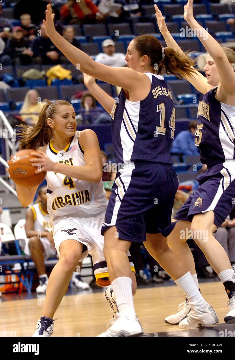 West Virginia's Meg Bulger looks for an opening as Pittsburgh's Vika ...