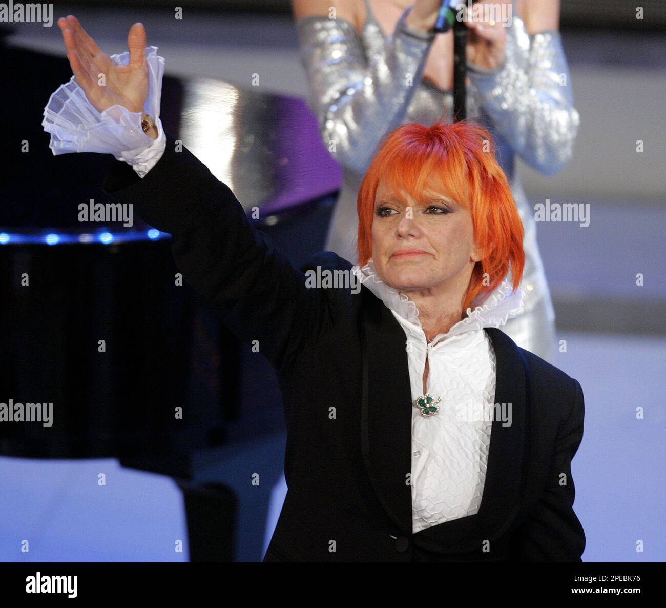 Rita Pavone waves to tthe audience during the Festival di Sanremo ...
