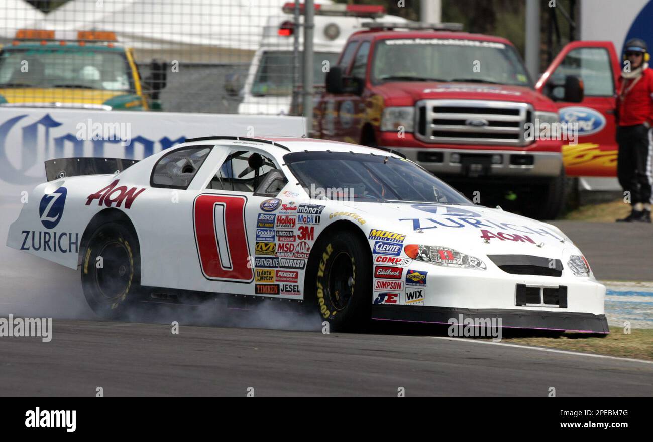 Driver Rafael Martinez of the Aon/Zurich Chevrolet team drives his car ...