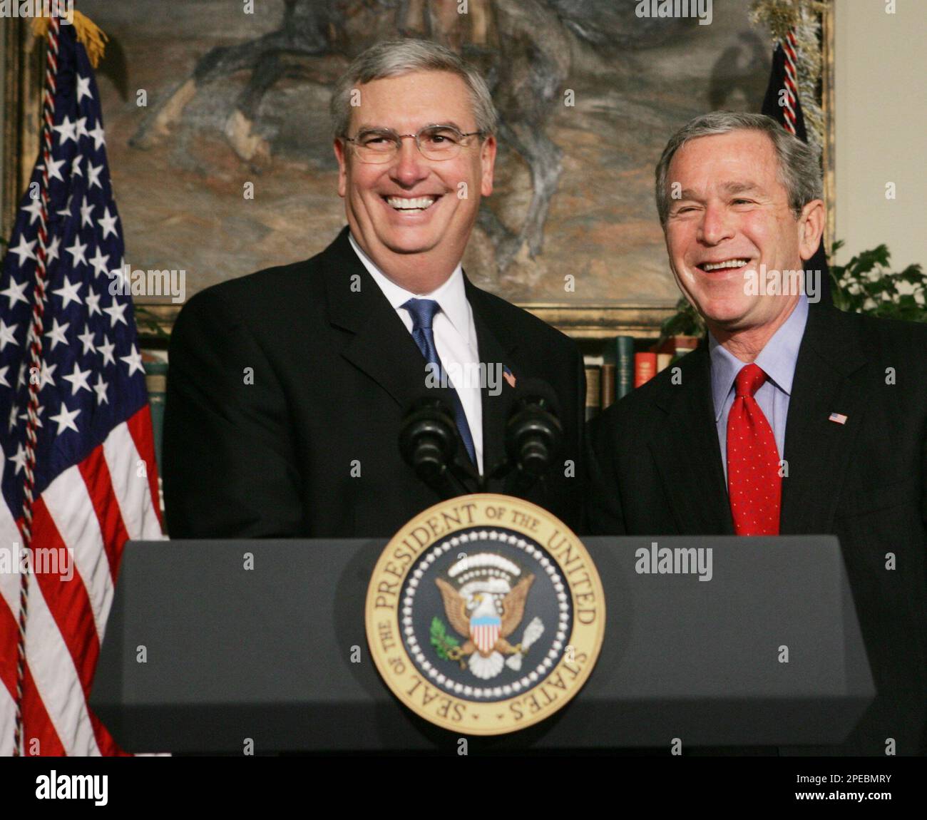 President Bush smiles after announcing Steve Johnson, left, as his ...