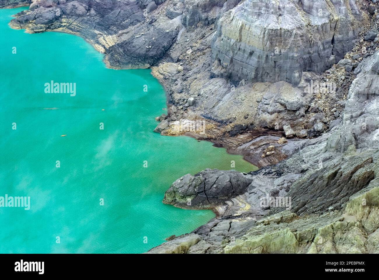 Turquoise-green coloured lake and side of crater, Mount Ijen, East Java ...