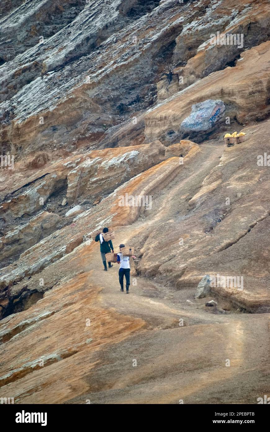 Two men carrying baskets hi-res stock photography and images - Alamy