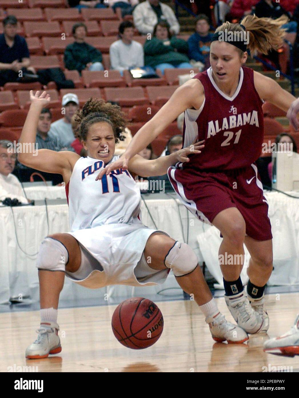 Alabama's Kate Mastin (21) fouls Florida's Sarah Lowe (11) during the ...
