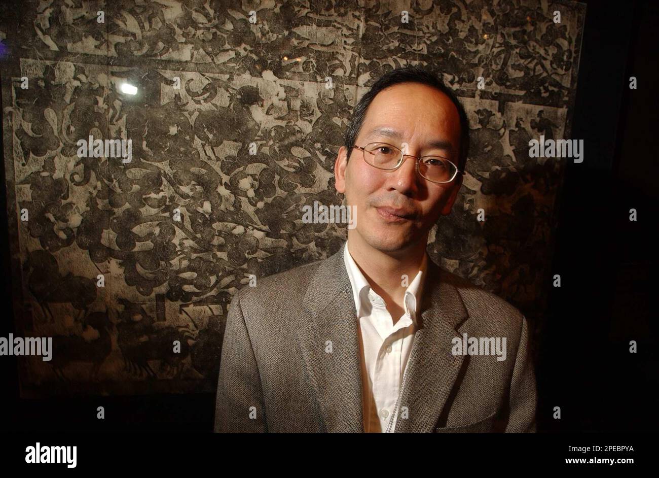 Cary Liu, curator of Asian Art, poses for a picture near an ink-on ...