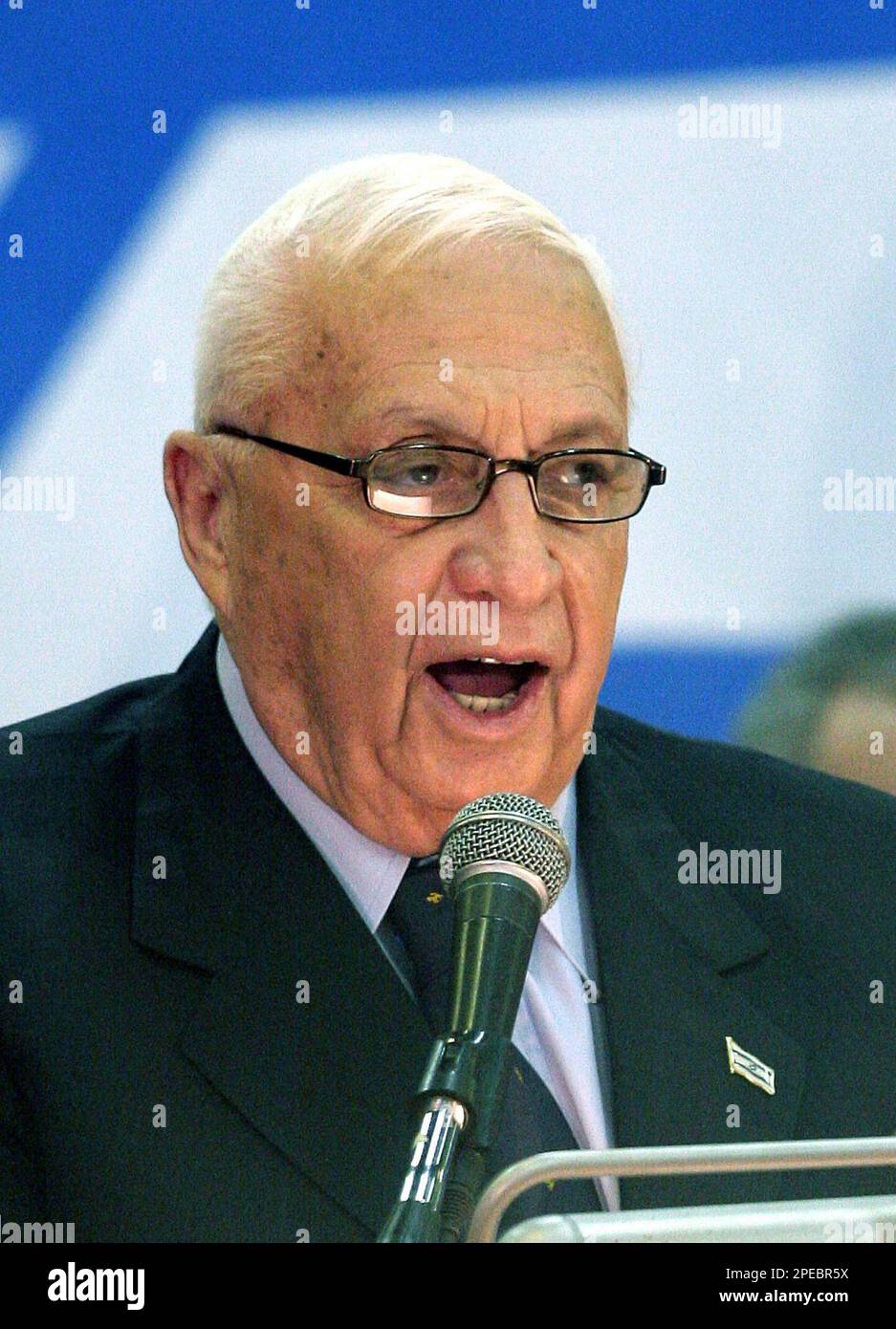 Israeli Prime Minister Ariel Sharon speaks at a Likud party convention ...