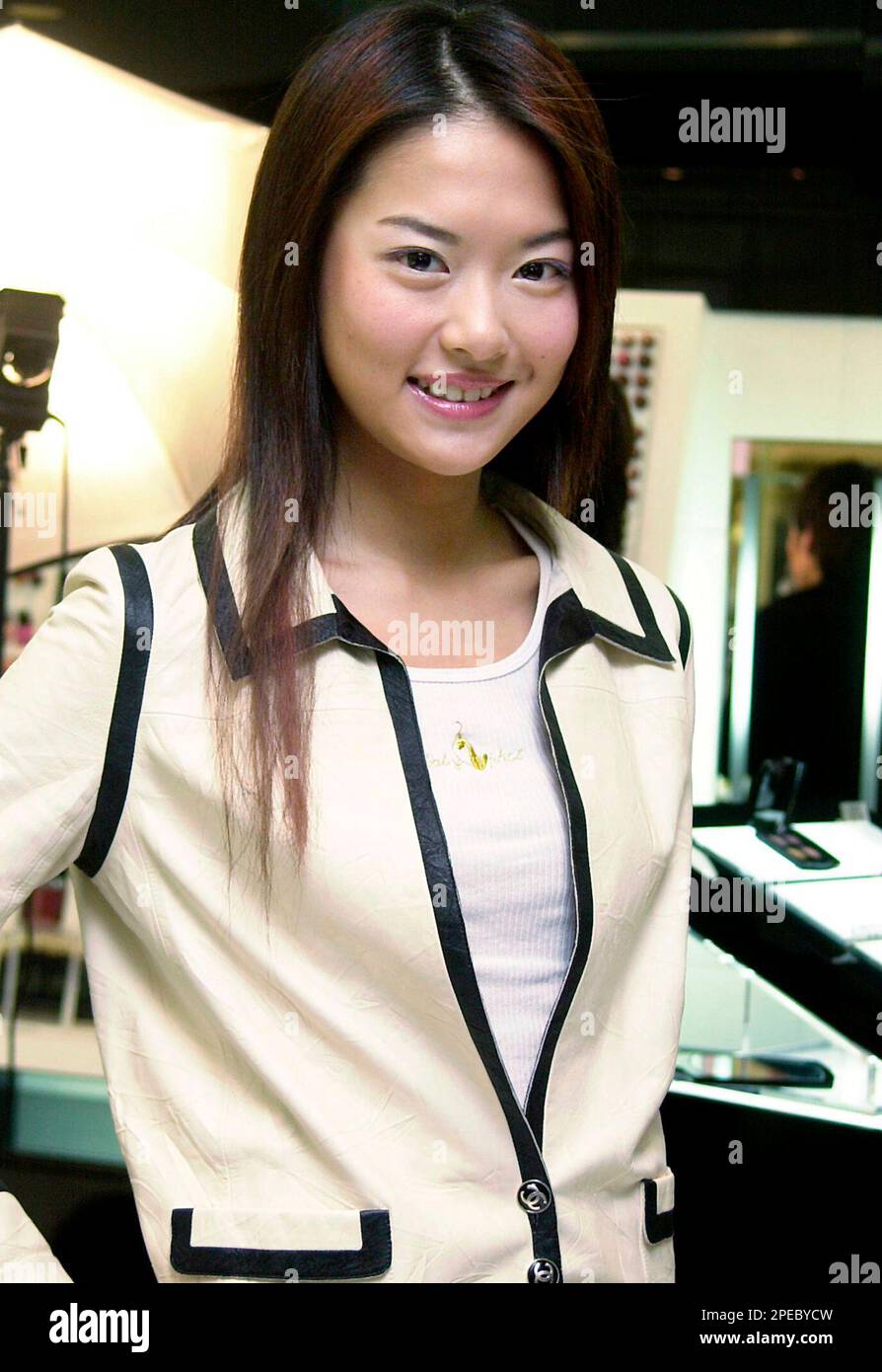 Hong Kong actress Monie Tung smiles as she poses for photographers ...