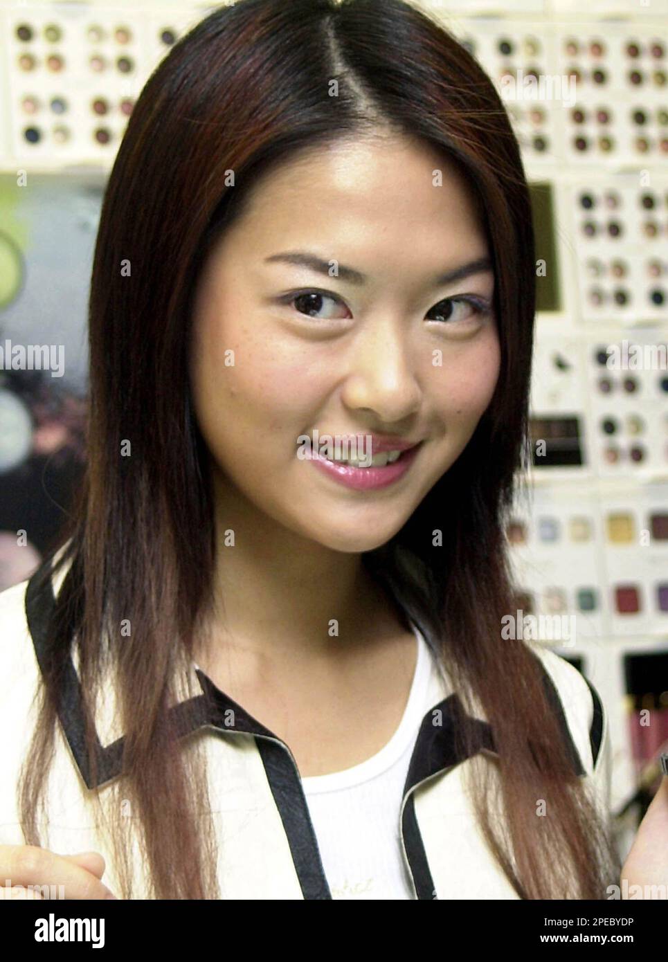 Hong Kong actress Monie Tung smiles as she poses for photographers ...