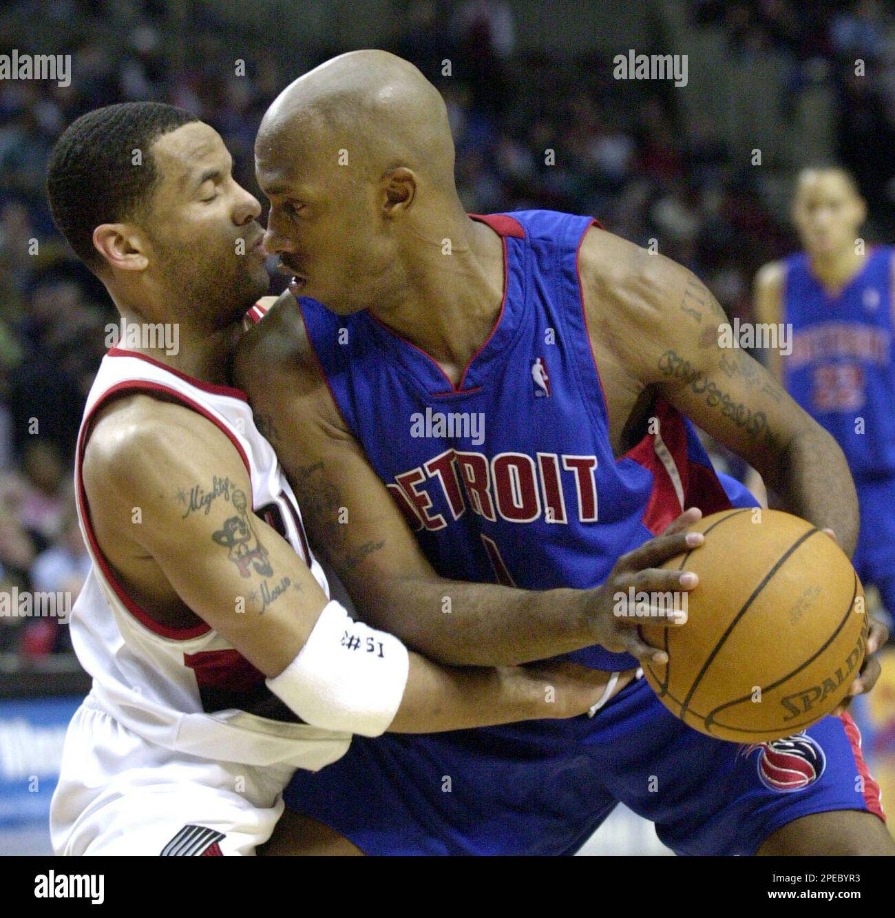 Detroit Pistons guard Chauncey Billups, right, fends off defensive ...