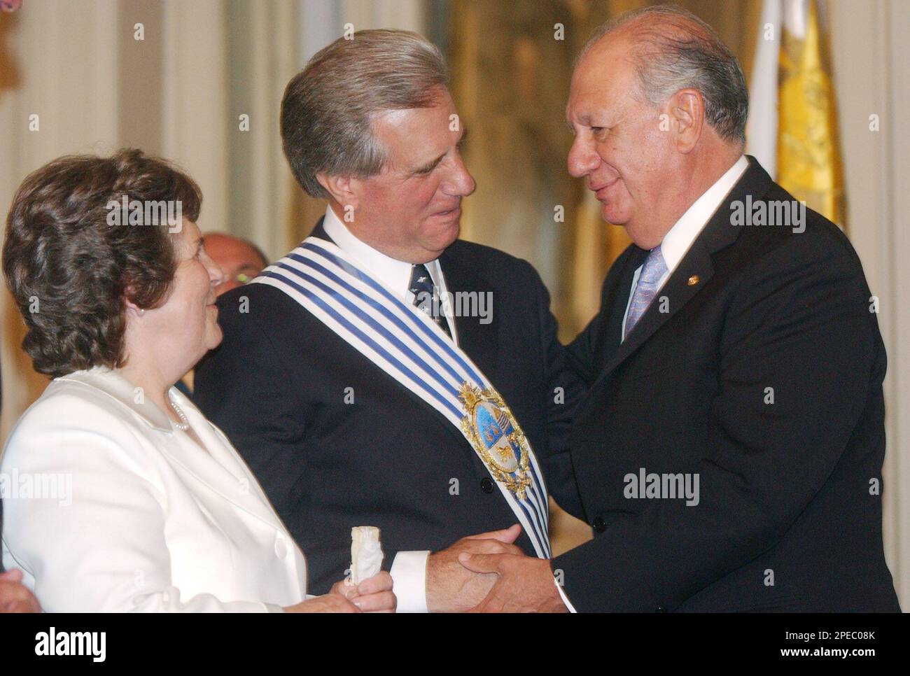 Uruguay's new President Tabare Vazquez, is congratulated by Chilean ...