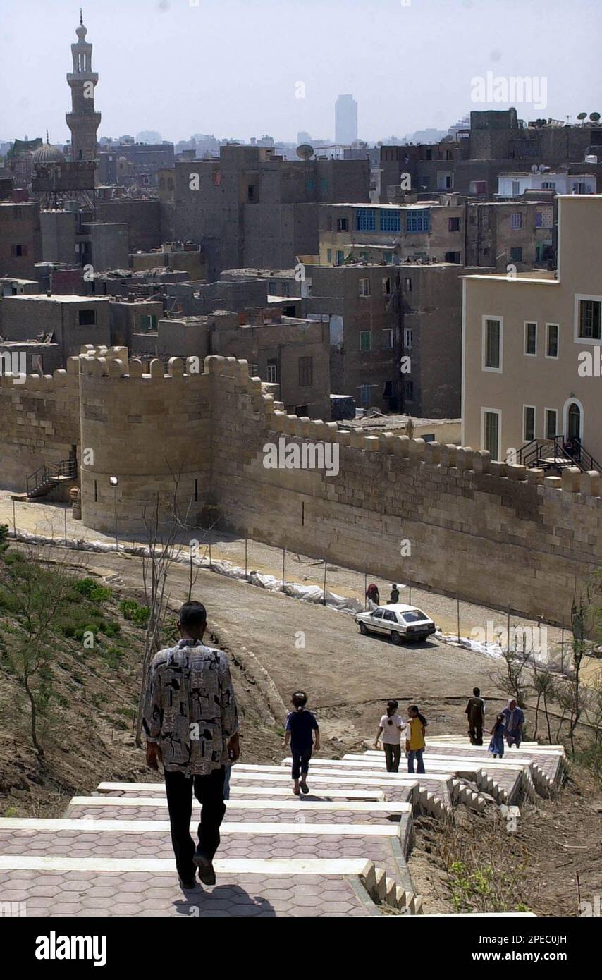 Egyptians walk down the stairs away from the newly built Al-Azhar Park ...