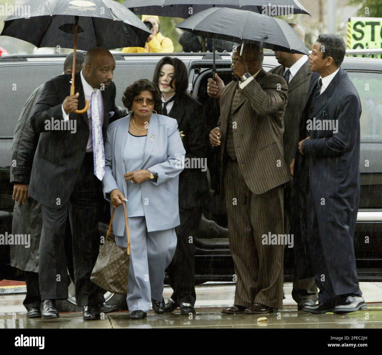Michael Jackson, his mother Katherine Jackson and brother Jermaine, far ...