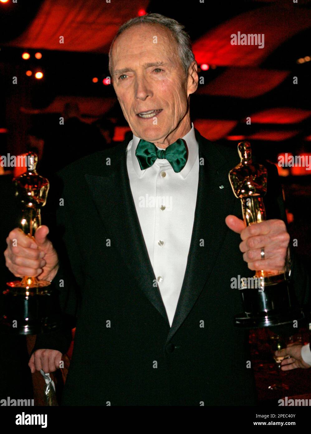 Clint Eastwood holds his two Oscars at the Governors Ball following the ...