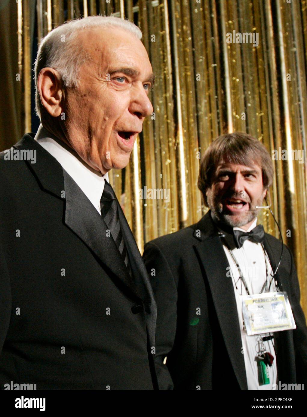 Producer Albert S. Ruddy reacts with stage manager Dency Nelson after ...