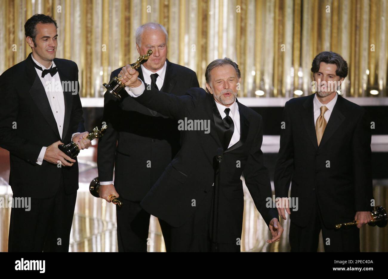 John Dykstra, center, accepts for Scott Stokdyk, left, John Frazier ...