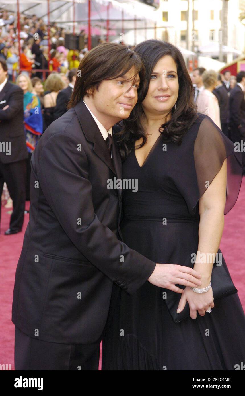 Comedian-actor Mike Myers arrives with his wife Robin Ruzan for the ...