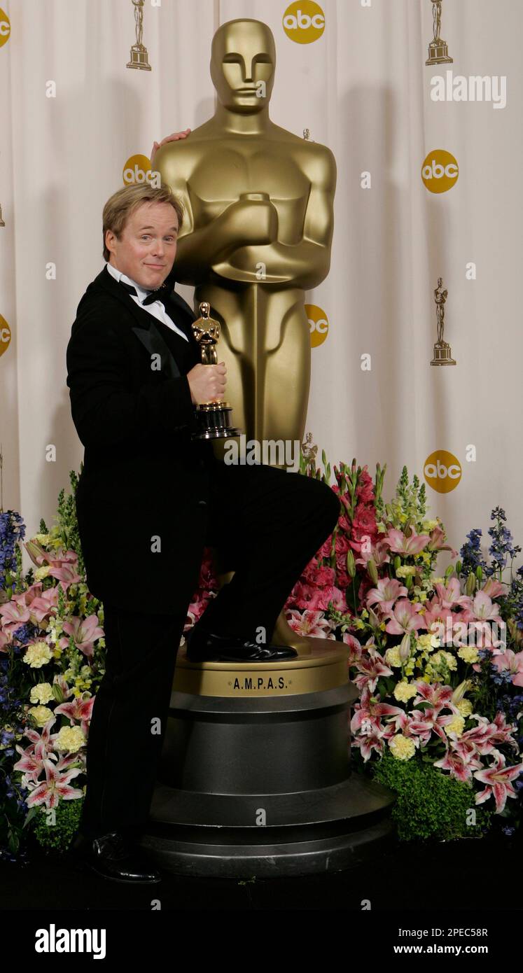 Brad Bird poses with the Oscar for best animated feature film for "The ...