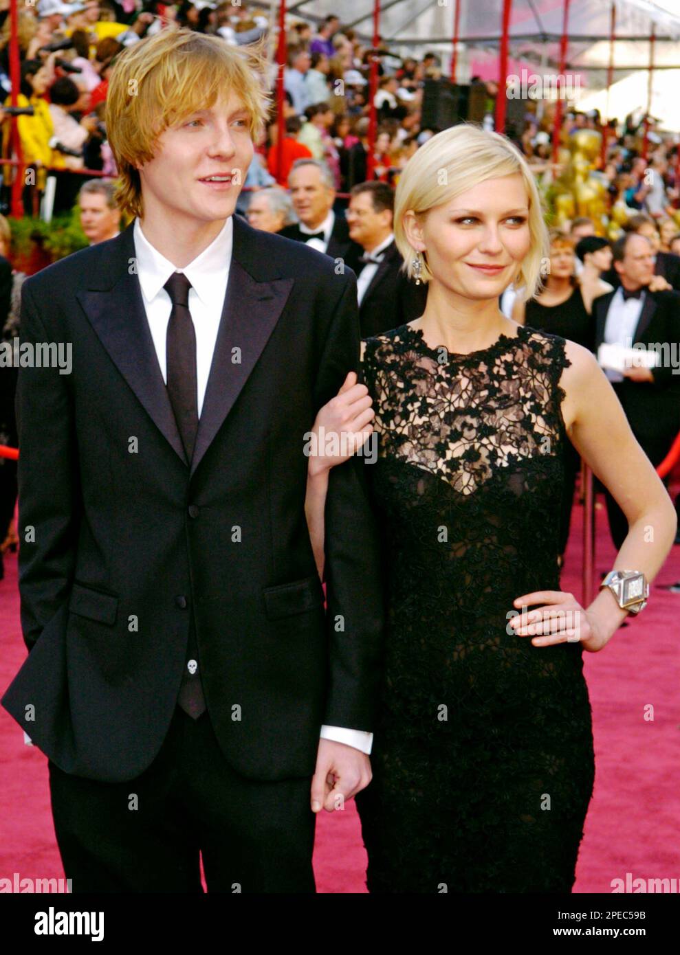 Actress Kirsten Dunst arrives with her brother Christian for the 77th ...