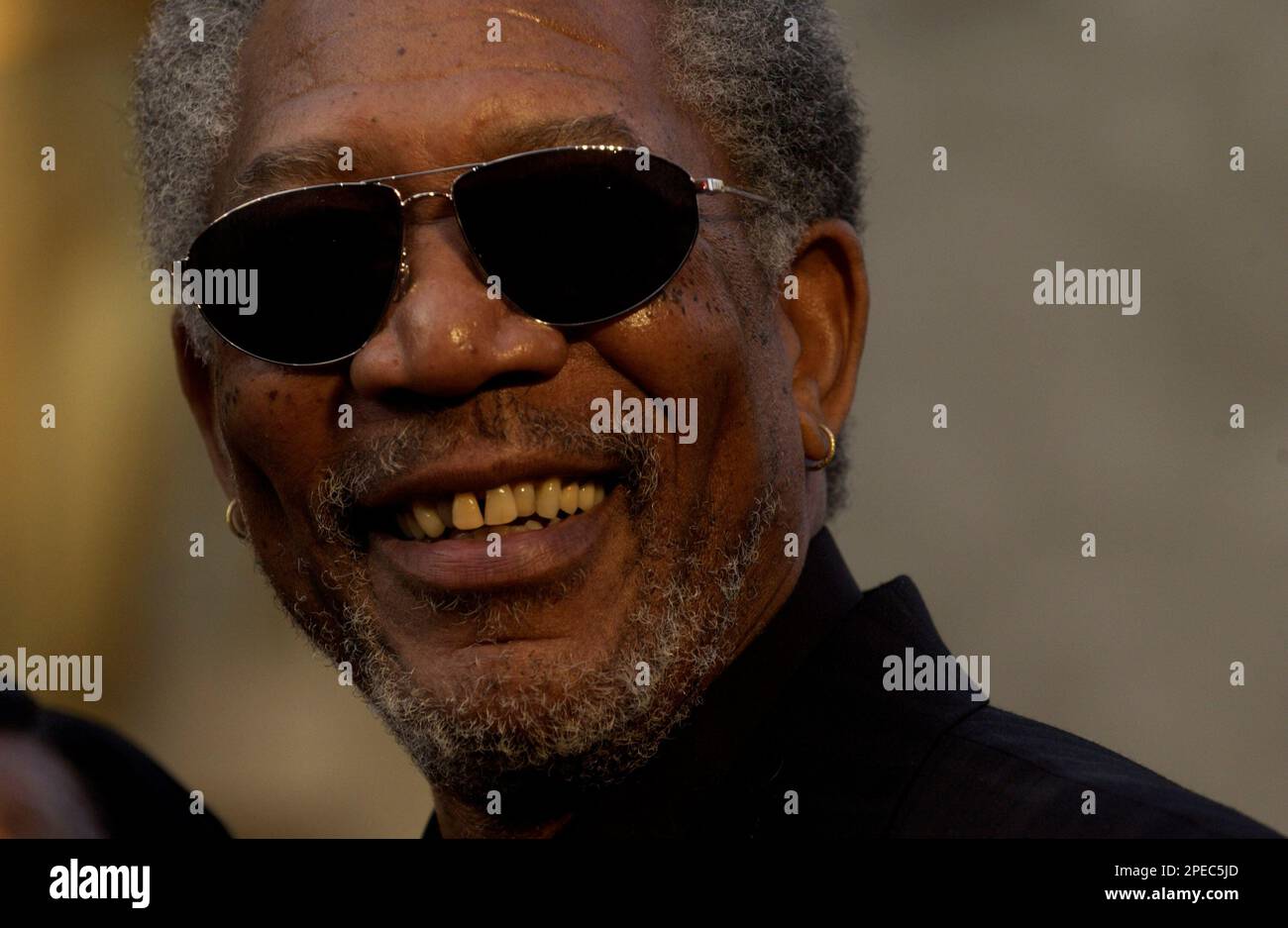 Best supporting actor nominee Morgan Freeman arrives for the 77th ...