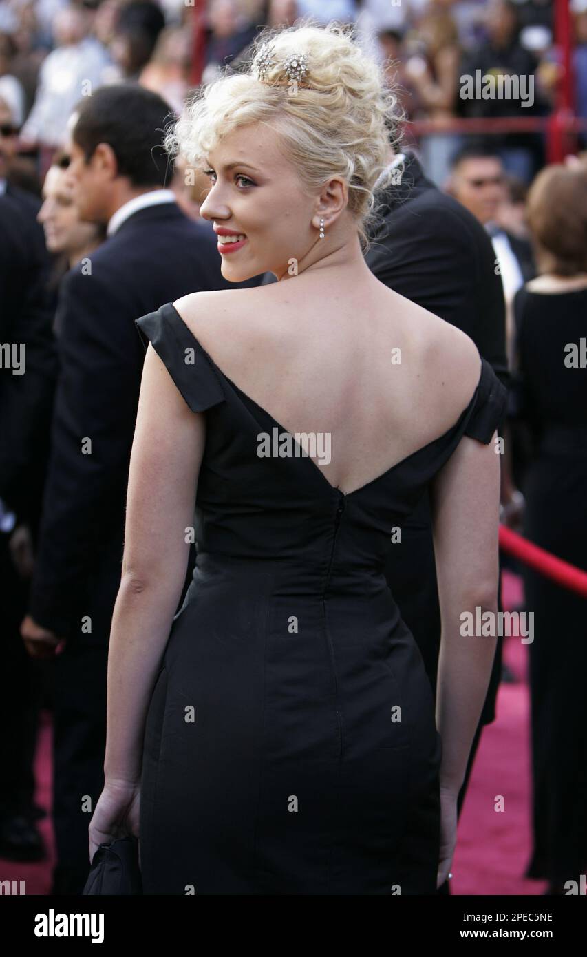 Actress Scarlett Johannson poses for photographers as she arrives for ...