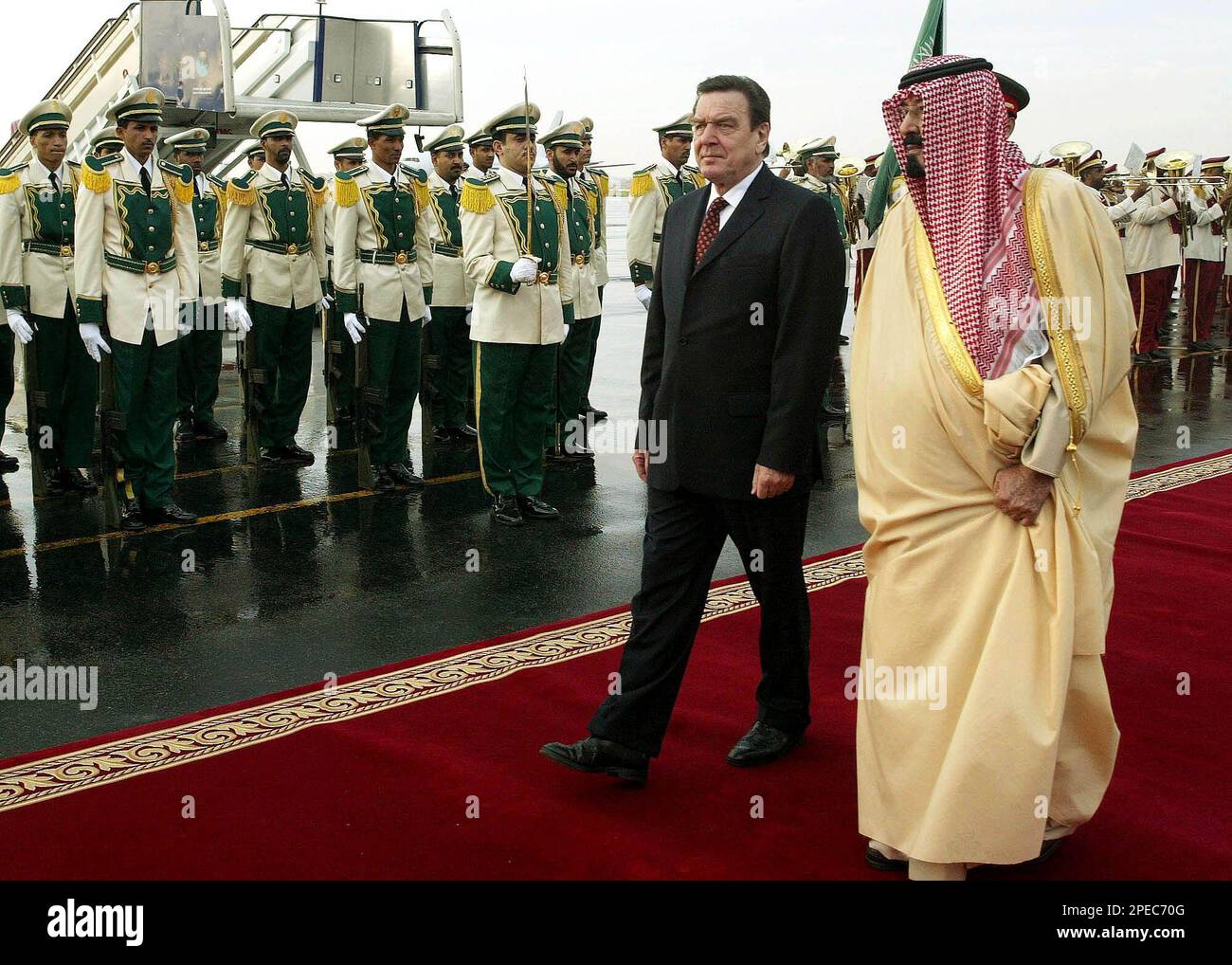 Saudi-Arabian Crown Prince Abdullah, right, welcomes German Chancellor ...