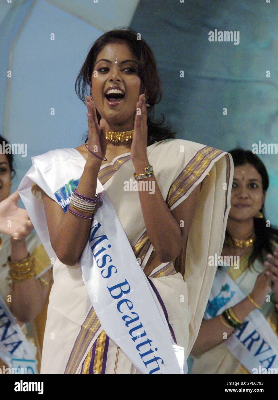 Jovita Tessa George reacts as her name is announced as the winner of ...