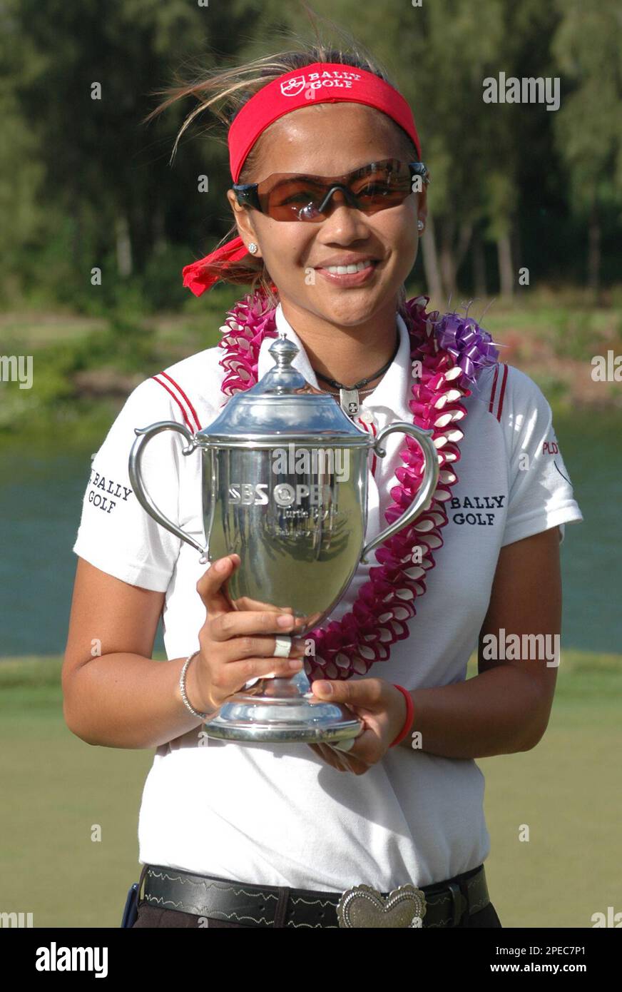 Jennifer Rosales of the Philippines displays her trophy after winning ...