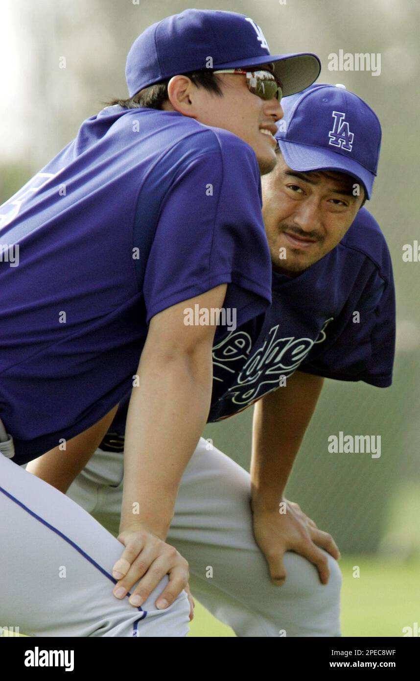 Los Angeles Dodgers first baseman Hee-Seop Choi, left, of South Korea ...