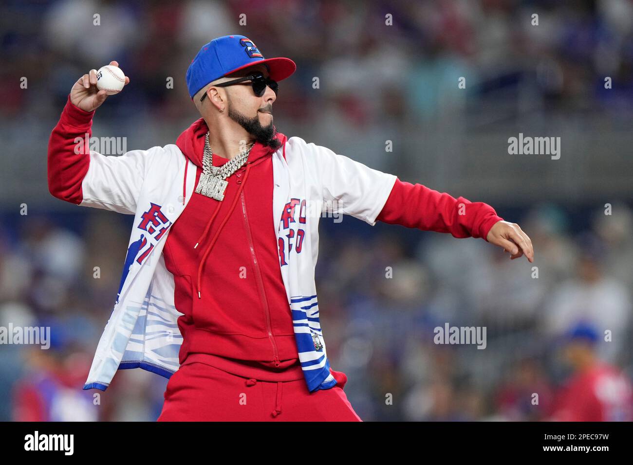 Puerto Rican singer Yandel throws out a ceremonial first pitch before ...