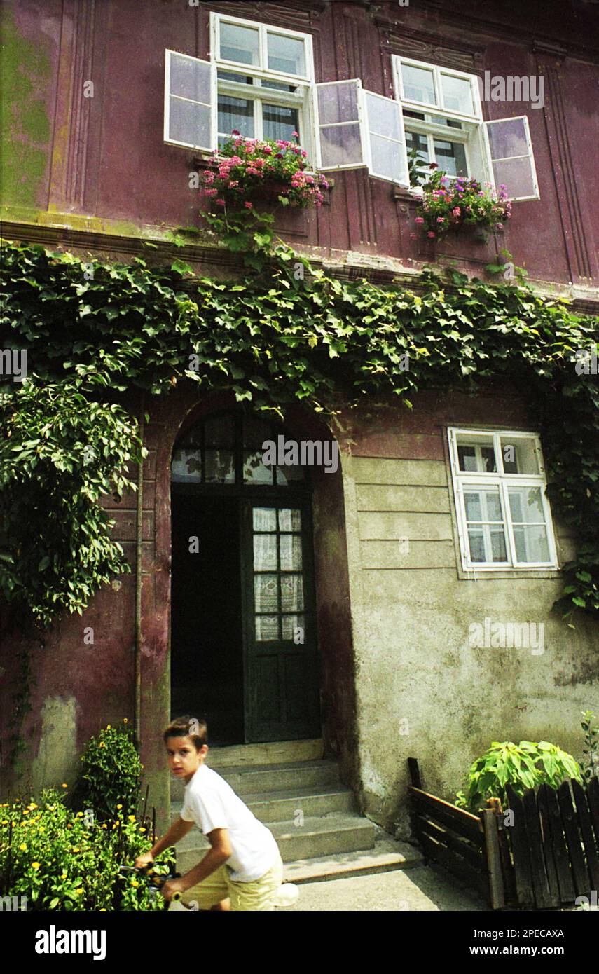 Alba County, Romania, approx. 1999. Exterior of a house featuring ...