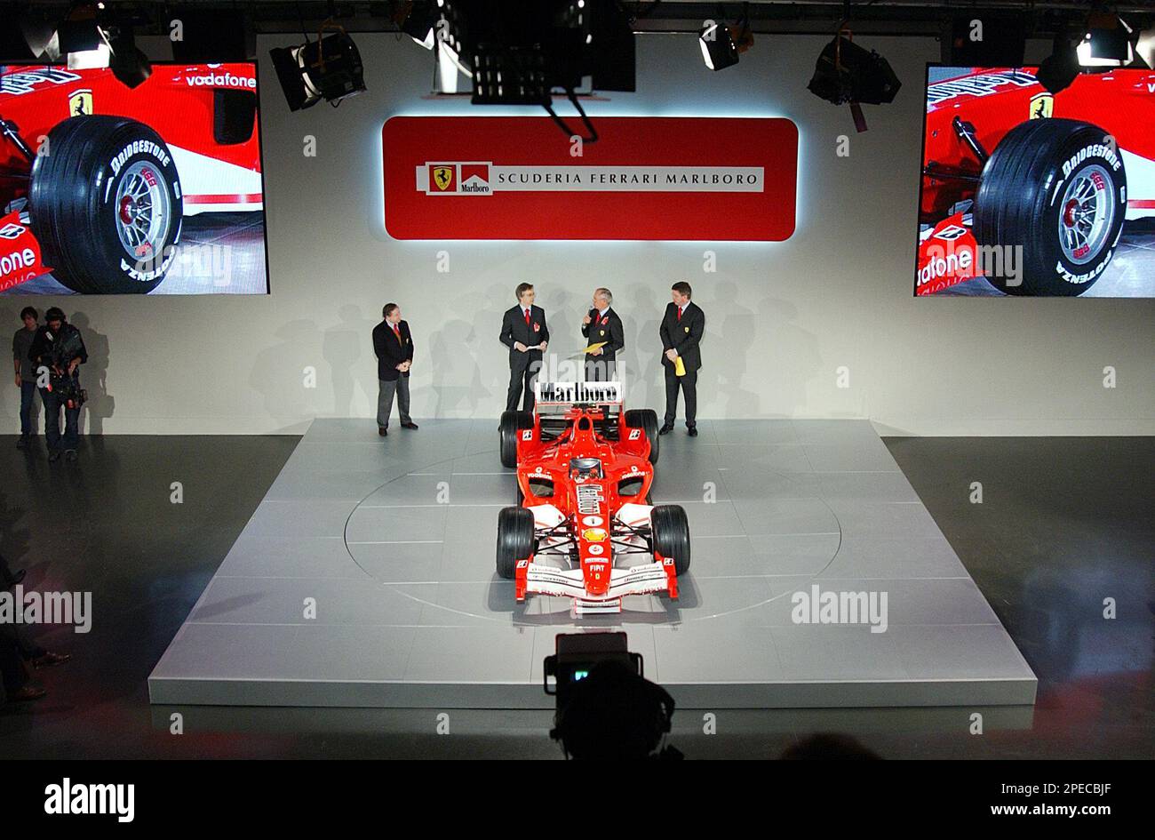 The tires of the new Ferrari F2005 Formula One racer are shown on ...