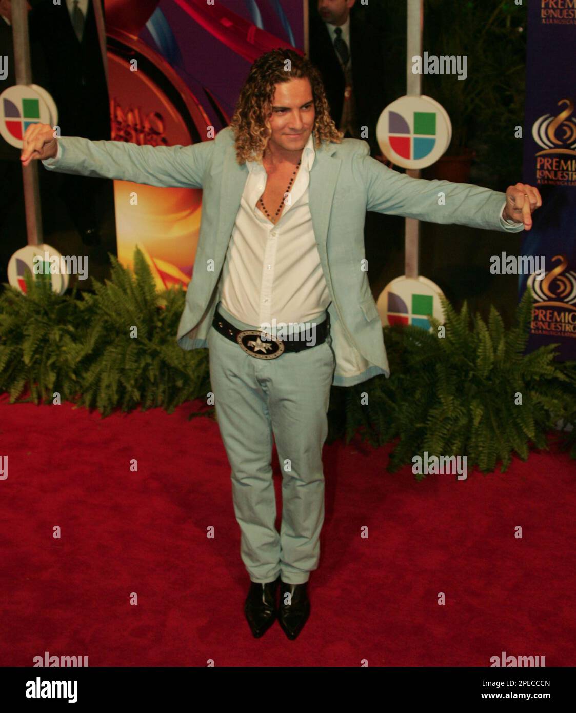 Spanish singer David Bisbal poses on the red carpet as he arrives at ...