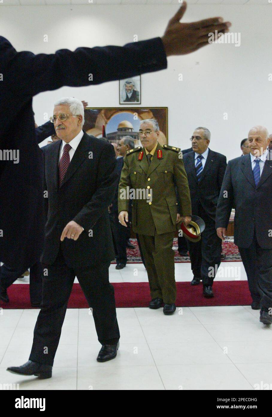 A bodyguard gestures as Palestinian Authority President Mahmoud Abbas ...