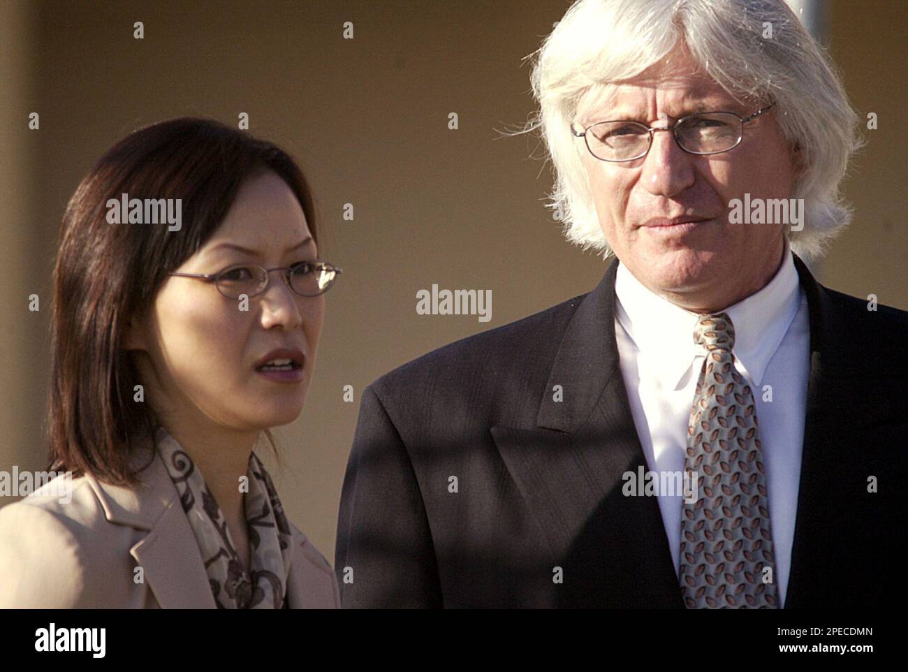 Michael Jackson's defense attorneys, Susan Yu, left, and Thomas ...