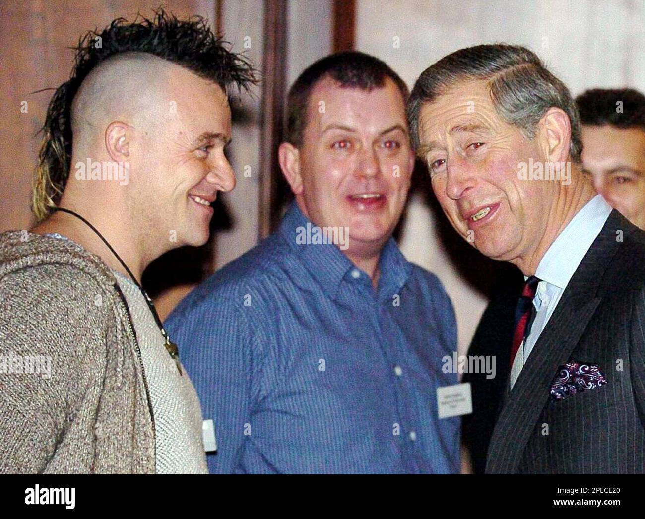 Britain's Prince Charles talks to Joel Lafferty, left, at Christ Church ...