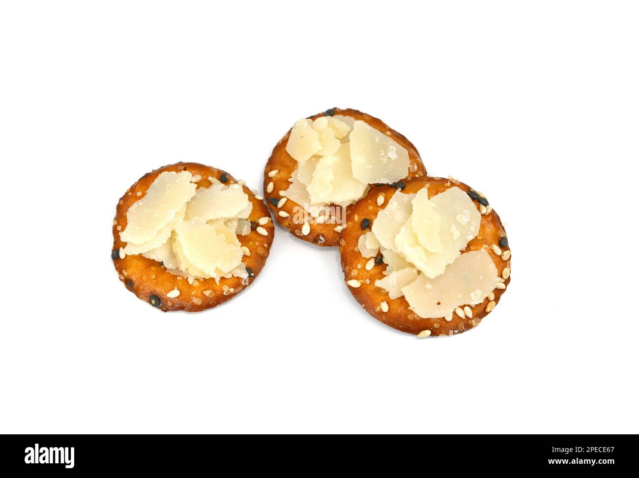 round crackers with parmigiano cheese flakes Stock Photo - Alamy
